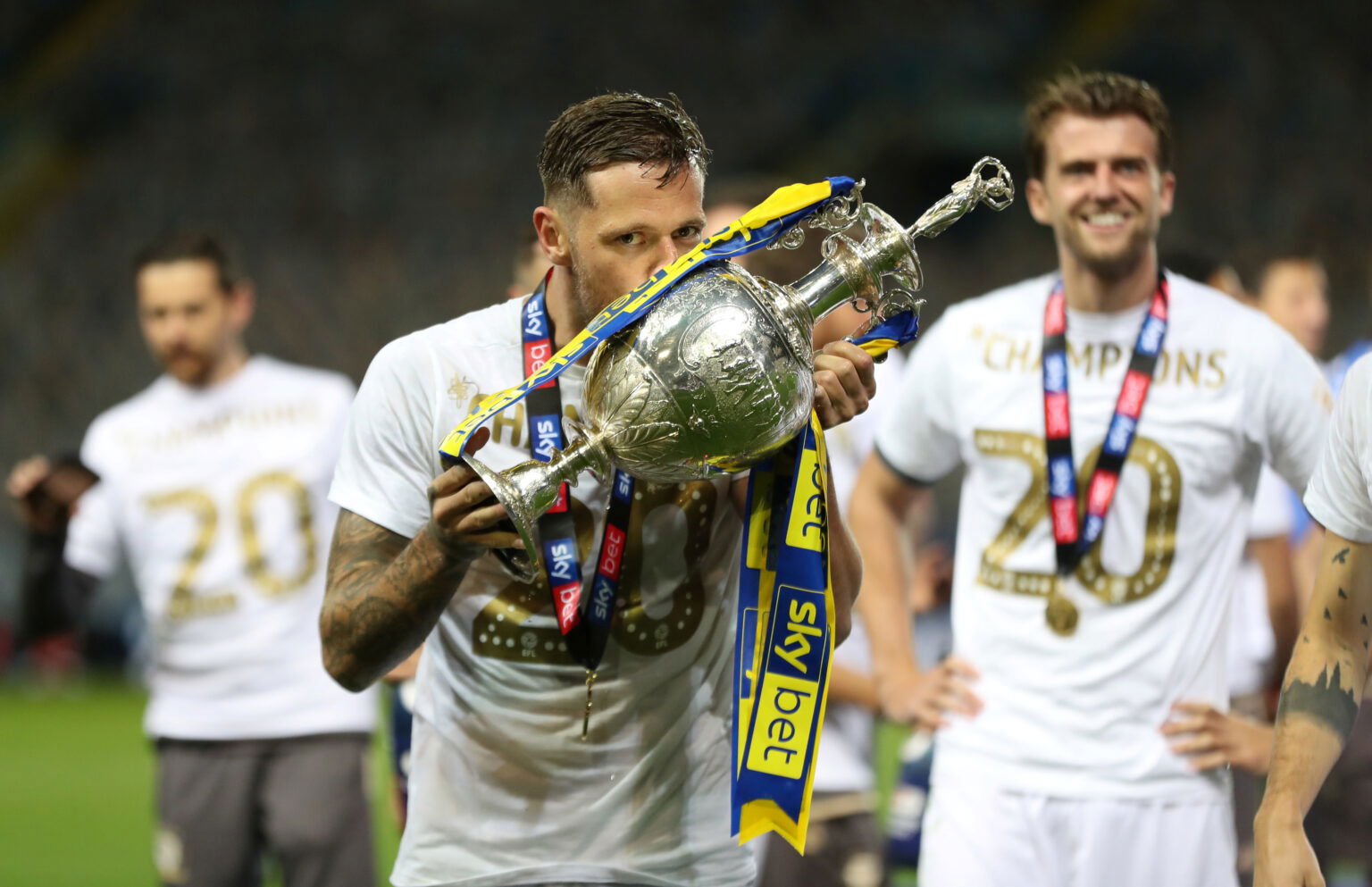 Liam Cooper dubbed Leeds United legend as Ben White reacts to transfer ...